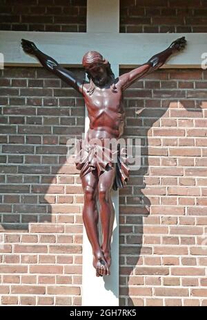 Cross hanging on ancient Roman stone bridge in Cangas de Onis, Asturias ...