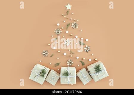 Christmas composition. Gifts, small tree, branches and craft DIY ...