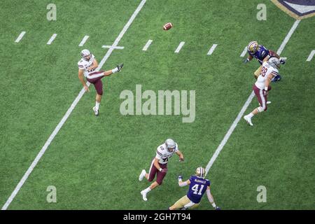 Montana Grizzlies place kicker Brian Buschini (29) punts the ball ...