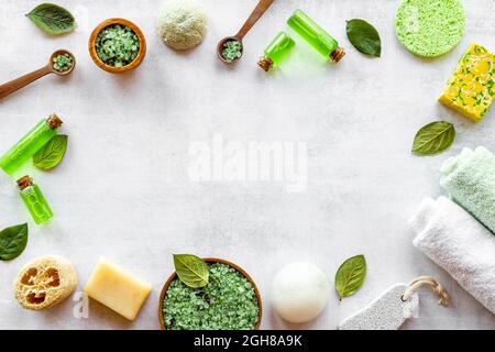 Frame of tea tree cosmetics with essential oil and green leaves Stock ...