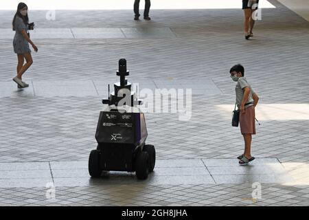 An HTX (Home Team Science and Technology Agency) ground robot, named ...