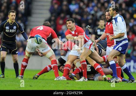 Mike Phillips of Wales feeds the ball during the rugby union Dove Men ...