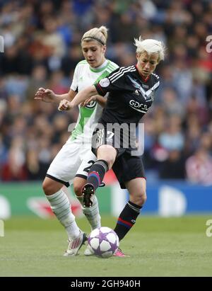 Wolfsburg's Luisa Wensing (L) and Lyonnais' Megan Rapinoe vie for the ...