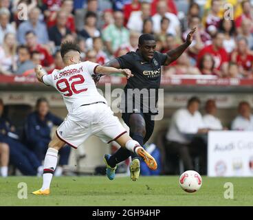 Micah Richards of Manchester City tussles with Danny Welbeck of ...