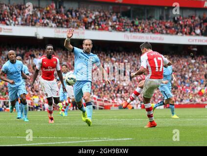 Arsenal's Alexis Sanchez scoring his sides third goal during the ...
