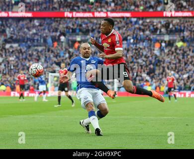 Manchester United's Anthony Martial and Everton's Theo Walcott during ...
