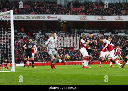 Nacho Monreal of Arsenal scoring the first goal during the premier ...