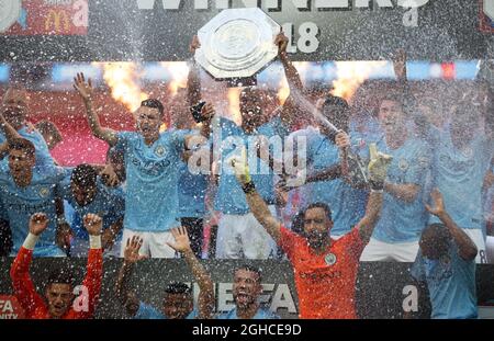 Manchester City players celebrate winning on penalties during the The ...