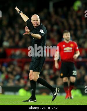 Referee Lee Mason gestures during the Premier League match at the ...
