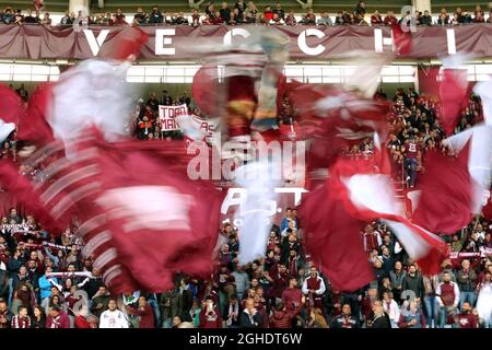 Torino FC fans pictured with scarves and flags during the Serie A match ...