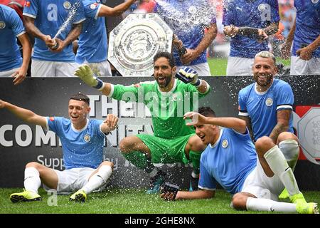 Manchester City players celebrate winning on penalties during the The ...