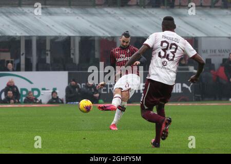 Zlatan Ibrahimovic of AC Milan fires a shot wide of the target during ...