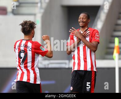 Brentford's Ethan Pinnock (5) celebrates scoring the opening goal ...
