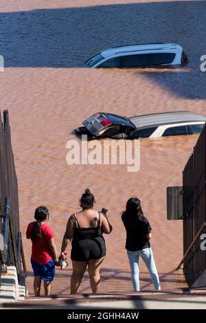 Vehicles left abandoned in a flooded ford in Watery Gate Lane ...