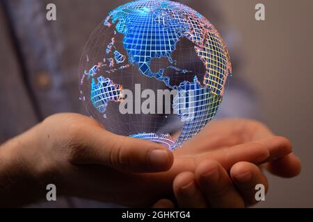A 3D rendered futuristic globe hovering between man's hands Stock Photo ...