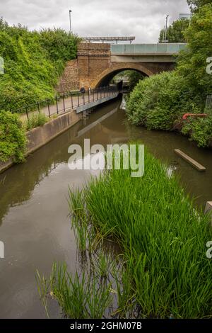 The river Darent or Darenth at Dartford Kent. Withe the tower of holy ...