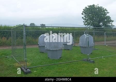 Open air urinals at a music festival Stock Photo - Alamy
