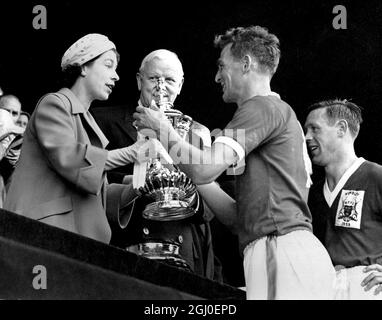 Nottingham Forest captain Jack Burkitt (c) lifts the FA Cup after his ...