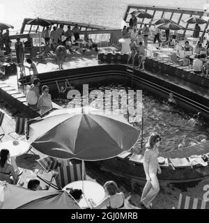 QE2 Pool Deck with Passengers Stock Photo - Alamy