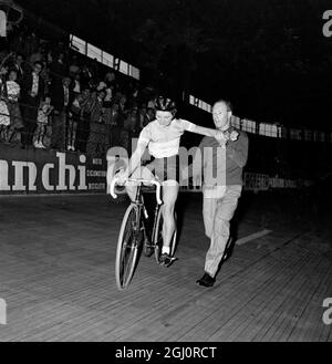 Milan , Italy : British woman cyclist Milly Robinson races around the ...