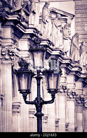 Architecture with columns and light post, Paris, France Stock Photo - Alamy
