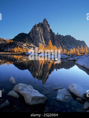 Prusik Peak reflected in a tarn near Leprechaun Lake, Enchantment Lakes ...
