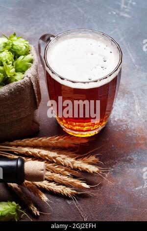 Green potato chips on old dark wooden table background, top view flat ...