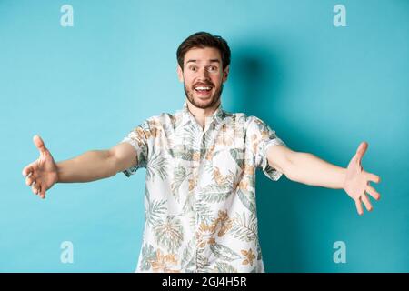 Summer holiday. Cheerful tourist stretch out hands for hug, welcome ...