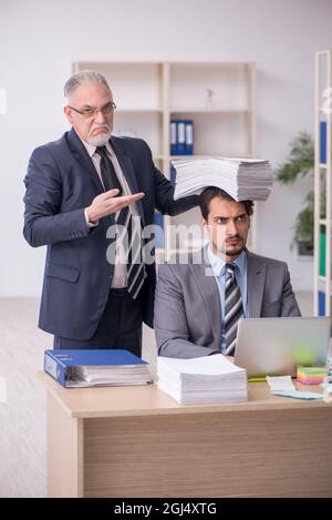 Two employees in bullying concept Stock Photo - Alamy