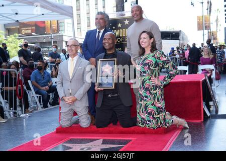 Radio personality Kurt Alexander aka Big Boy (left) poses with wife ...