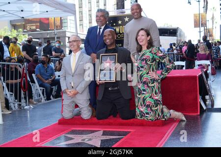 Radio personality Kurt Alexander aka Big Boy (left) poses with wife ...