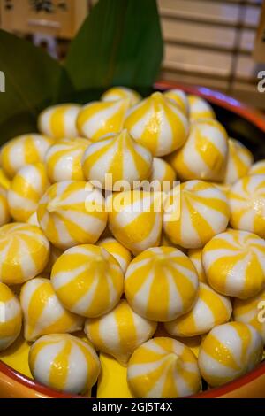 Steamed Chinese dumplings with fish roe in bamboo steaming basket with ...