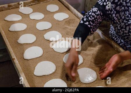 State of Qatar, Doha. Traditional bread making. (Editorial Use Only ...