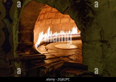 State of Qatar, Doha. Traditional bread making. (Editorial Use Only ...