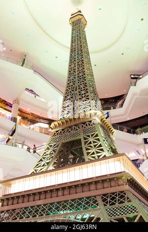 Shopping mall interior. Eiffel tower replica in the Terminal 21 theme ...