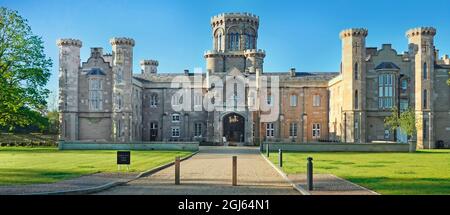 Entrance & stone façade of historical Studley Castle Grade II listed ...