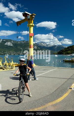 A landscape around Lake Annecy on a sunny day. Lake Annecy is a ...