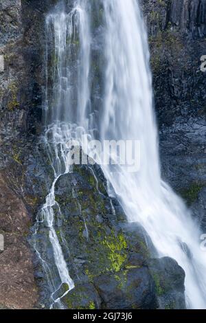 Iceland, Glanni Waterfall. The Fossa River flows over the cliffs ...