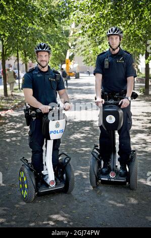 STOCKHOLM 2011-07-06 Police officers are seen patrolling on a Segway in ...