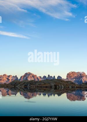 The summits of Brenta mountain range are reflected in Lago Nero. Brenta ...