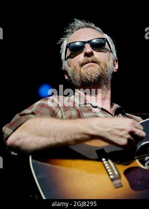 Singer-songwriter Billy Bragg performs during the demonstration ...