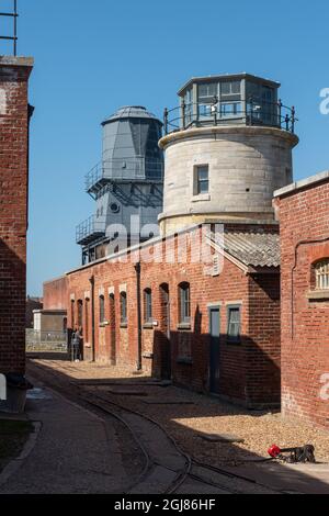 Hurst Castle, established by Henry VIII, with Hurst Point Lighthouse in ...