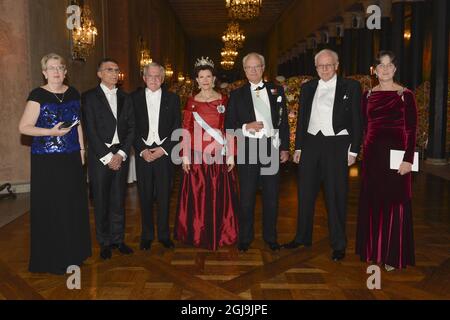 STOCKHOLM 2015-12-10 Swedens King and Queen (C) pose for photographer ...