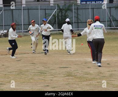 Kashmiri girl cricket players in action at Sports stadium Kunzer in North Kashmir’s Baramulla ...