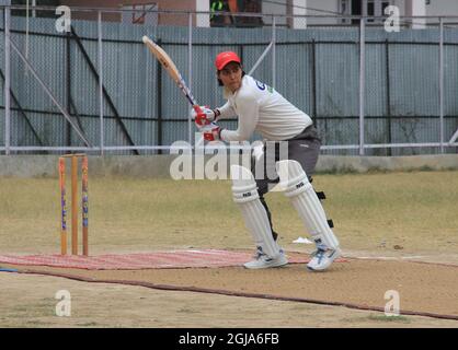 Kashmiri girl cricket players in action at Sports stadium Kunzer in North Kashmir’s Baramulla ...