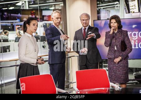 Queen Silvia and and TV meteorologist Pia Hultgren are seen in the TV ...