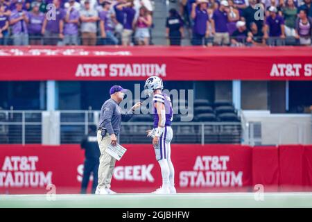 Kansas State head coach Chris Klieman watches from the sidelines during ...