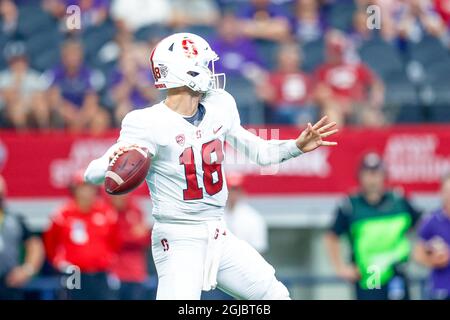 Stanford quarterback Tanner McKee (18) makes a pass in the first half ...