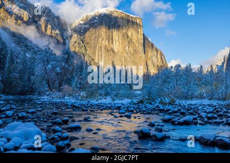 Merced River. Autumn first snow in Yosemite National Park, California ...
