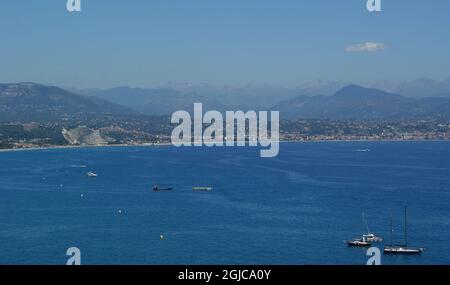 ANTIBES, FRANCE - Aug 12, 2011: A natural view of the rocky coast of ...